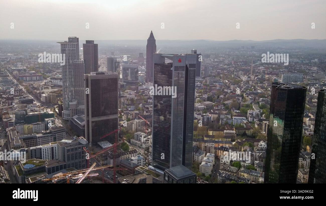 Aerial view of a modern city skyline featuring tall skyscrapers and ...