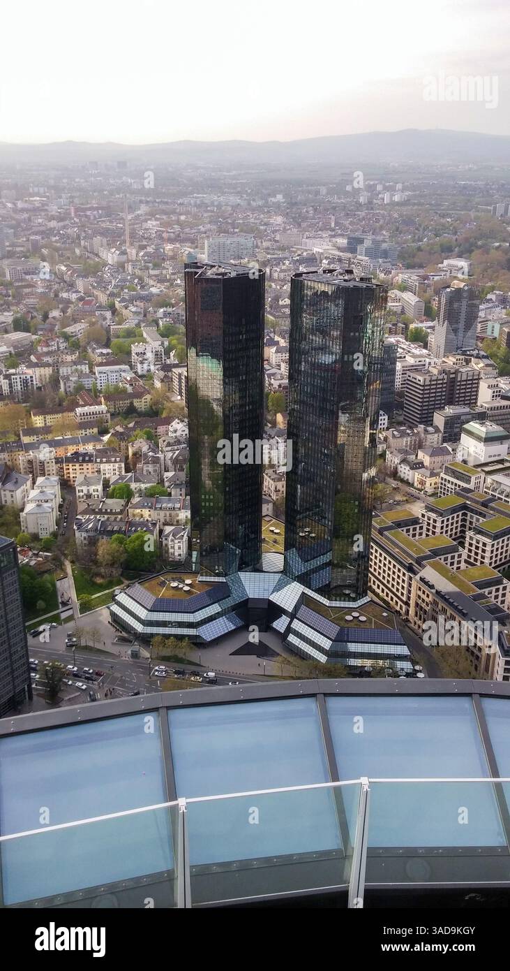 Aerial view of two modern skyscrapers with reflective glass facades ...