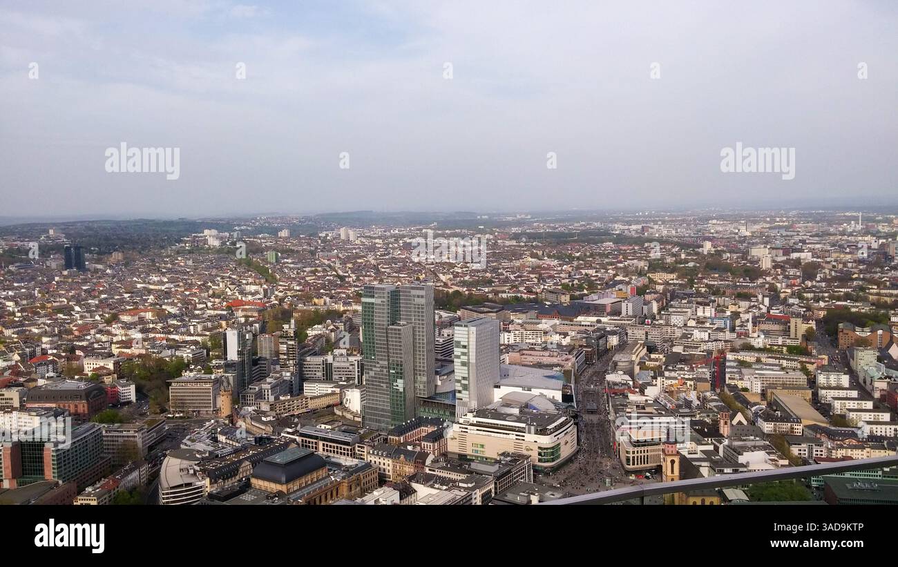 A panoramic view of a cityscape featuring modern buildings, streets ...