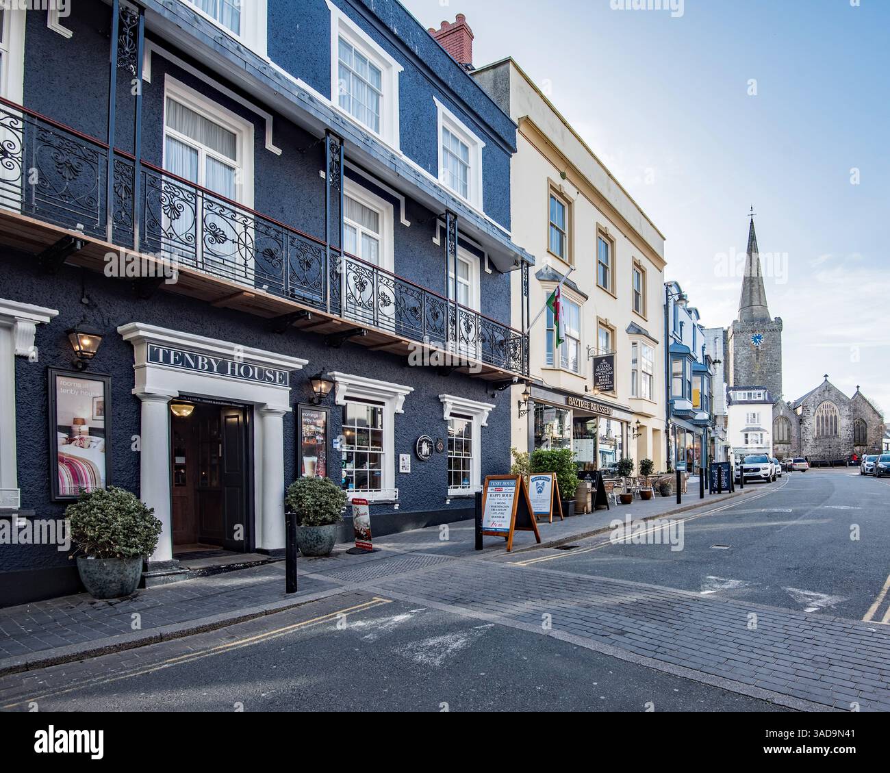Tenby House in April 2025, and view of the spire of St Marys church ...
