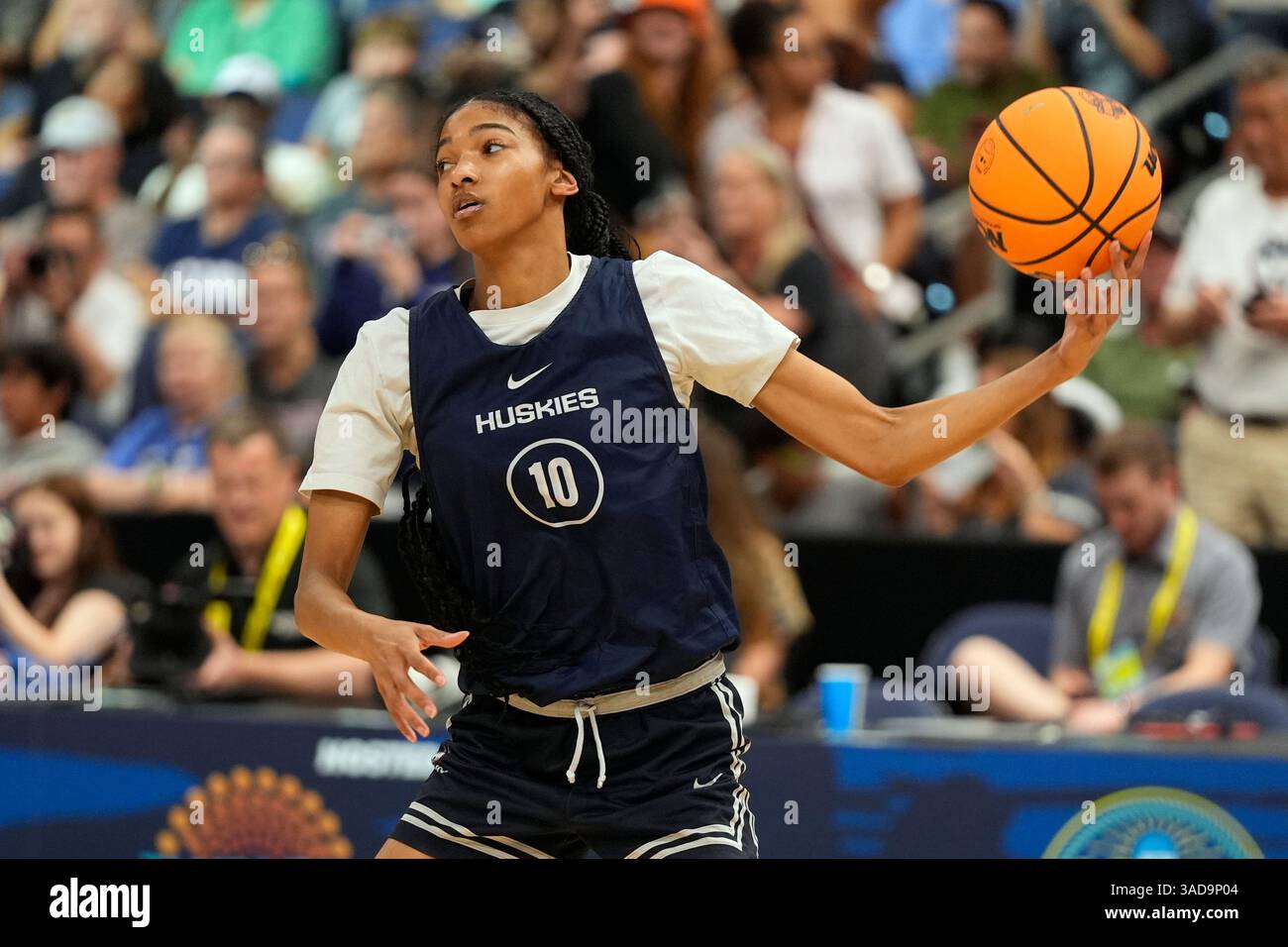 UConn guard Qadence Samuels (10) grabs a rebound during a drill at ...