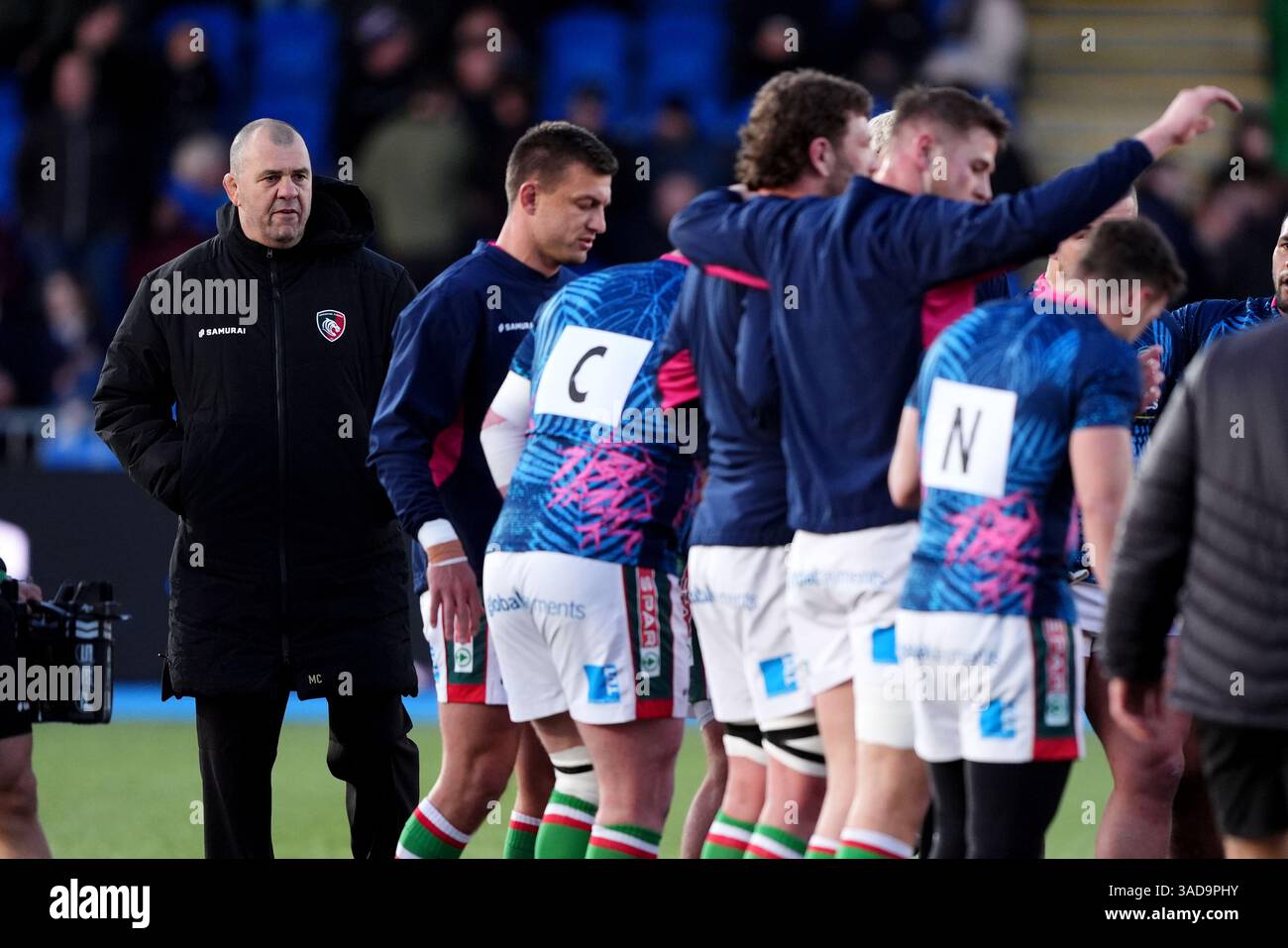 Leicester Tigers coach Michael Cheika watches over the warm up before ...