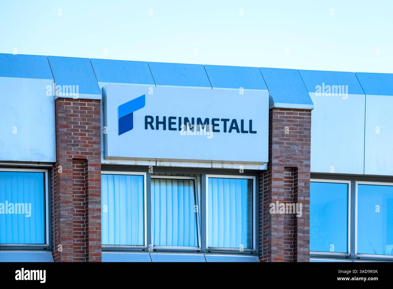 Rheinmetall logo prominently displayed on the facade of a modern office ...