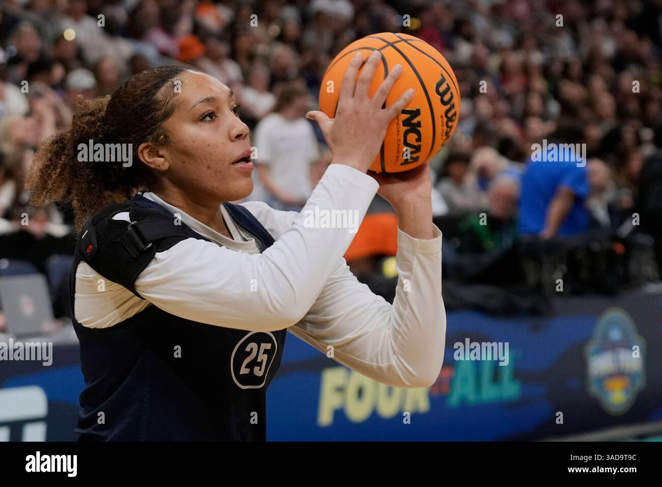 UConn forward Ice Brady (25) shoots during practice at the Final Four ...