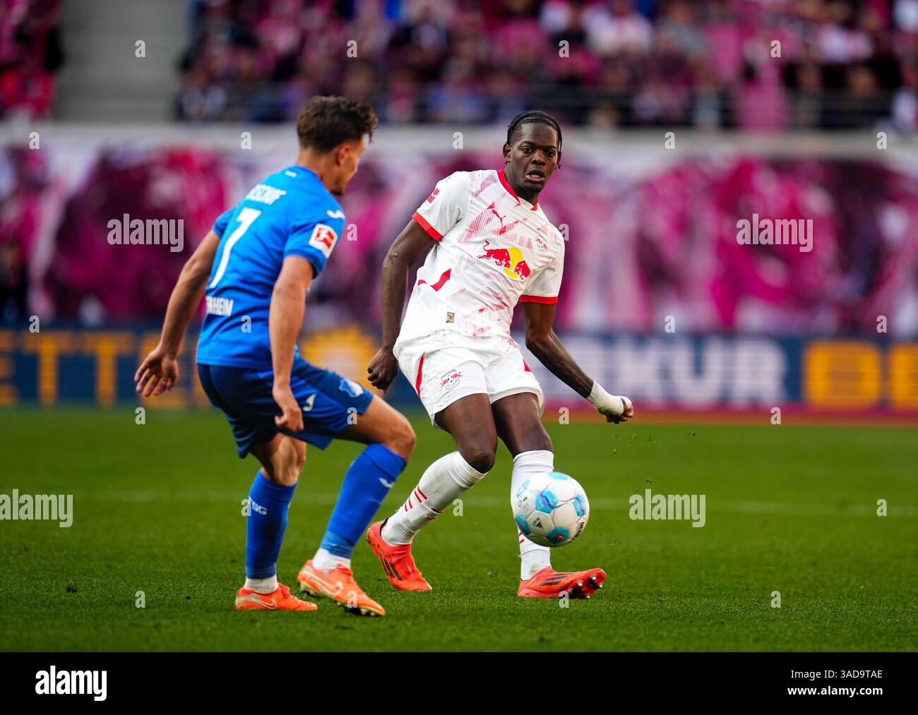 April 05 2025: Castello Lukeba of RB Leipzig controls the ball during a ...