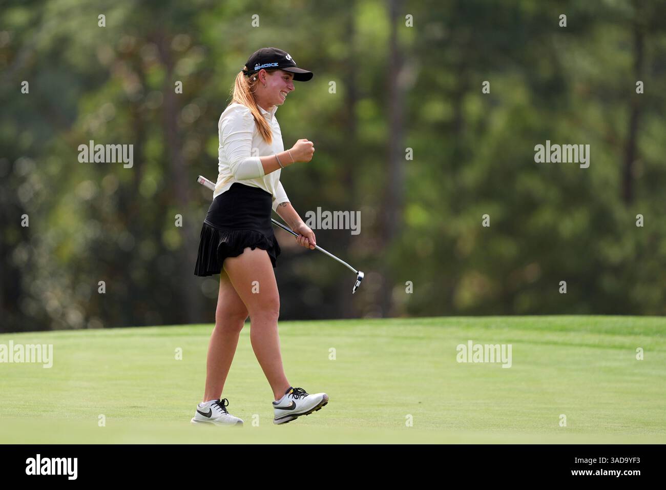 Carla Bernat Escuder, of Spain, reacts after winning the Augusta ...