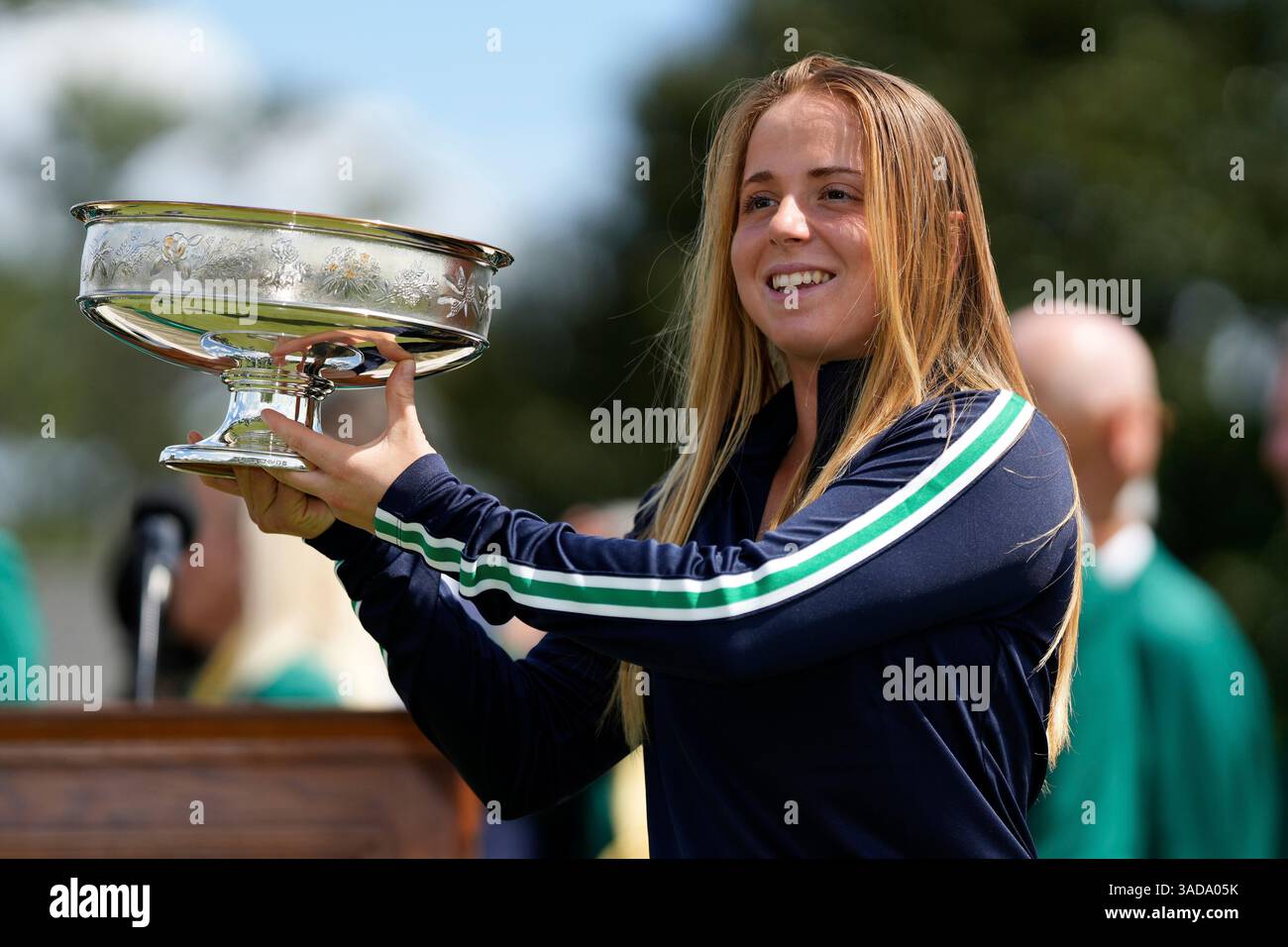 Carla Bernat Escuder, of Spain, poses with the trophy after winning the ...