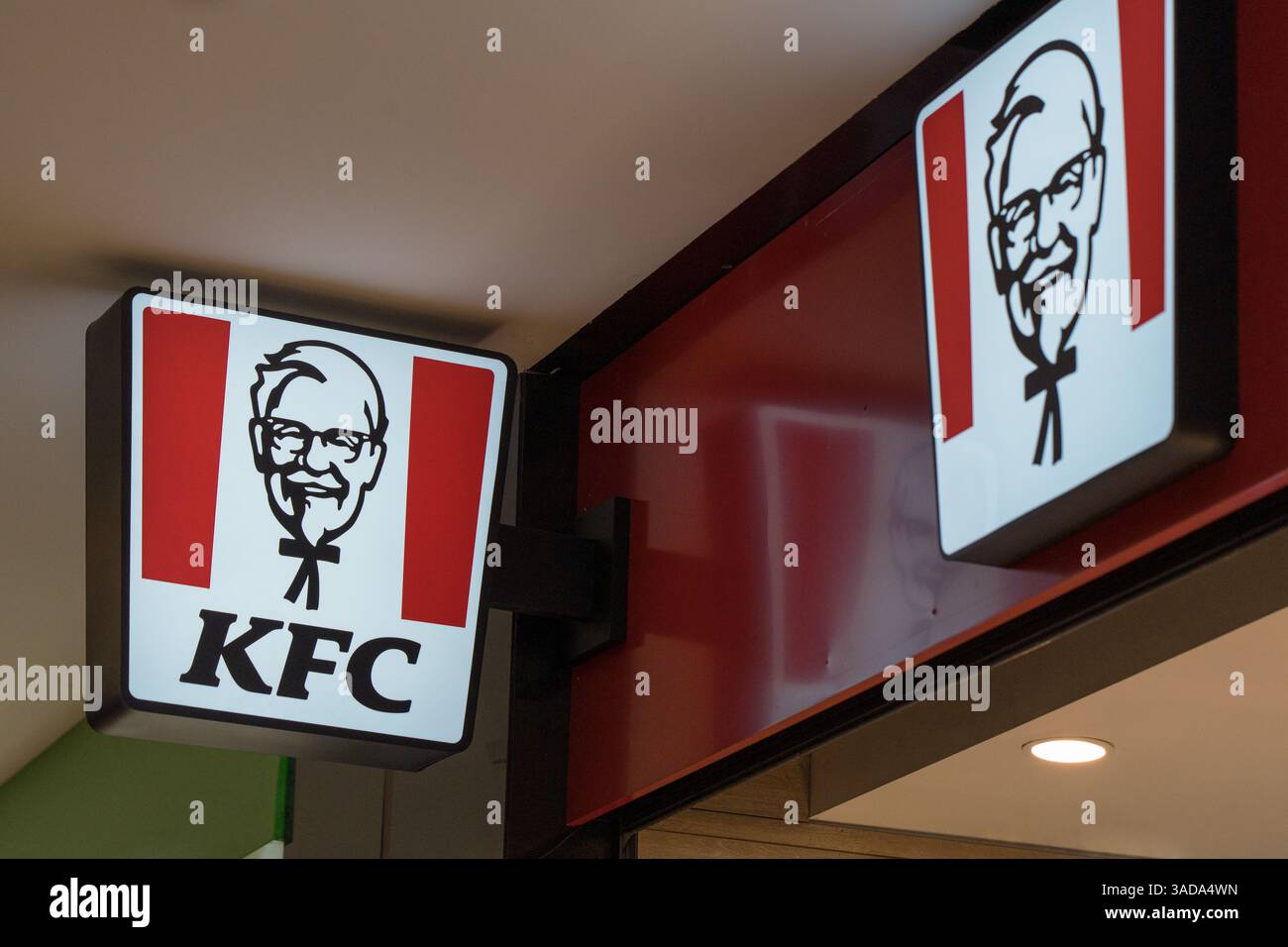 Kentucky Fried Chicken logo. KFC glowing sign on the wall in the ...