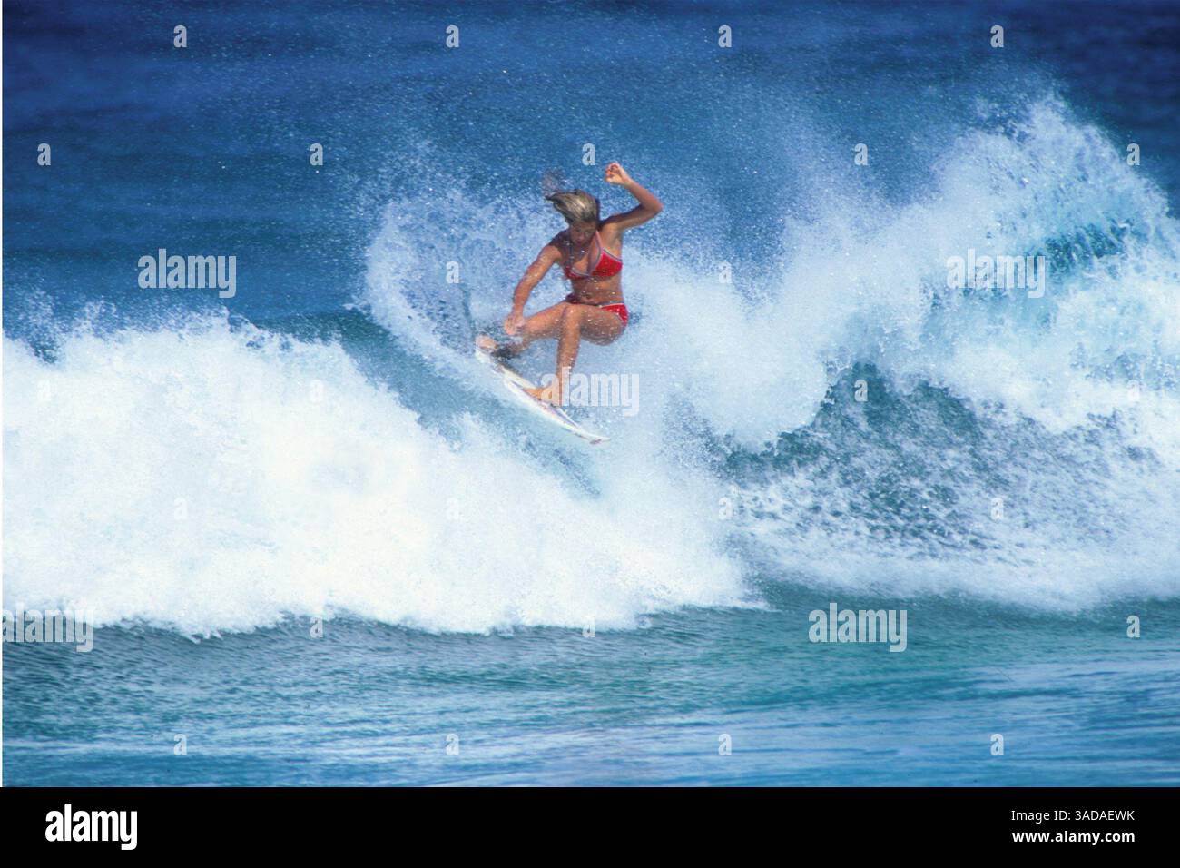 Dec 12, 2000; North Shore, Hawaii, USA; Surfer SERENA BROOKE slashes ...