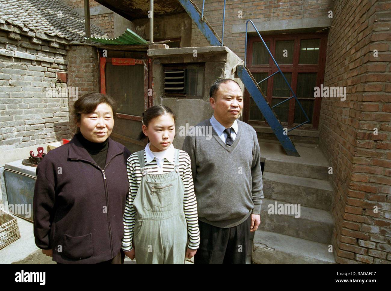 Mar 26, 2002; Kaifeng, CHINA; A family of Kaifeng Jewish descendants; Lu Jin He (father) with Ai ...