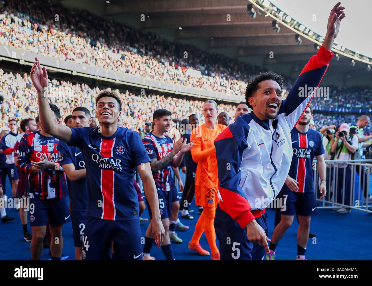 PSG's Marquinhos, right, and PSG Desire Doue celebrate winning the ...