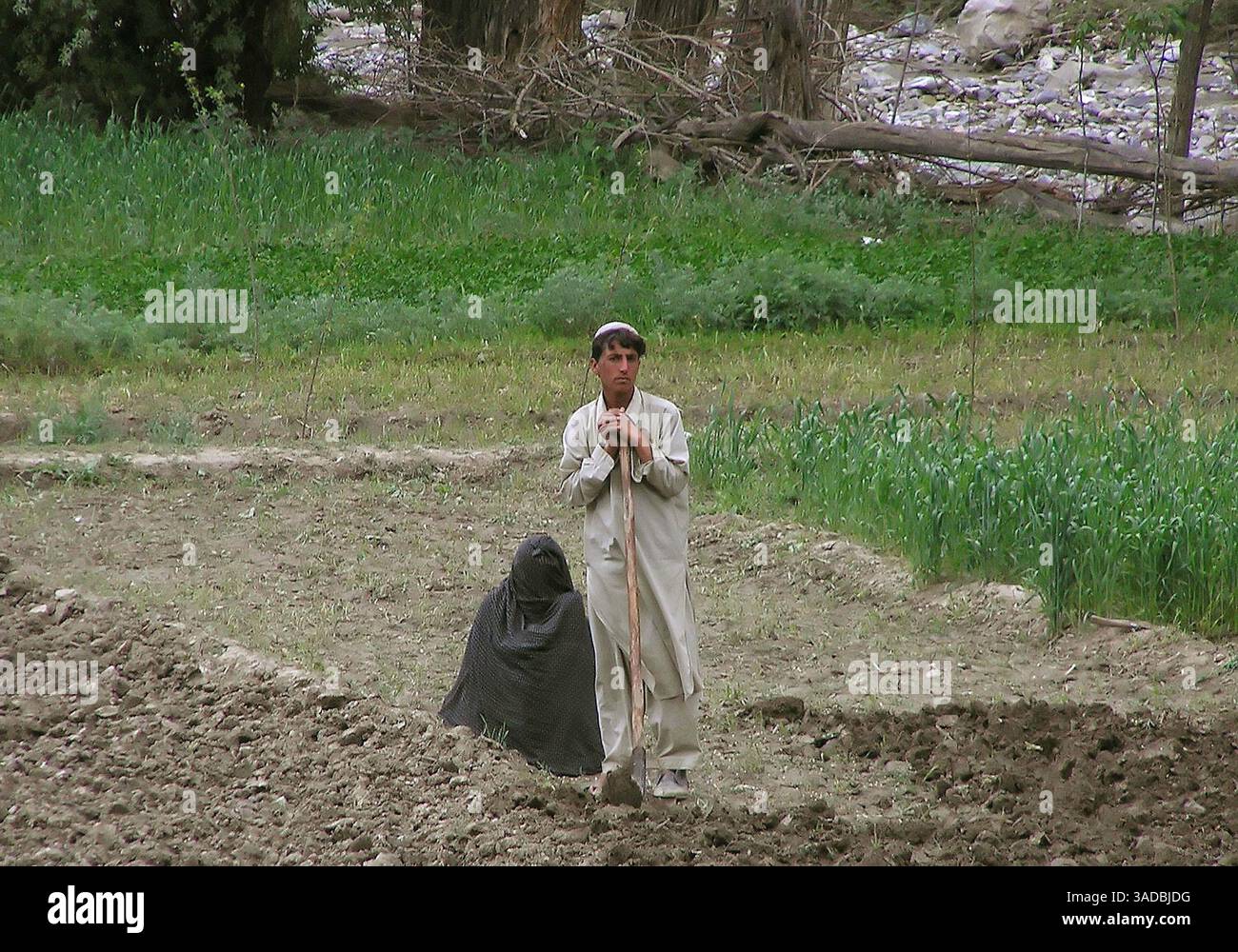 May 26, 2005; KHOWST, AFGHANISTAN; An Afghan man with his burka ...