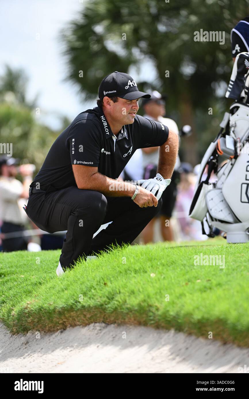 Patrick Reed of the 4Aces GC looks at the green before his chip shot ...