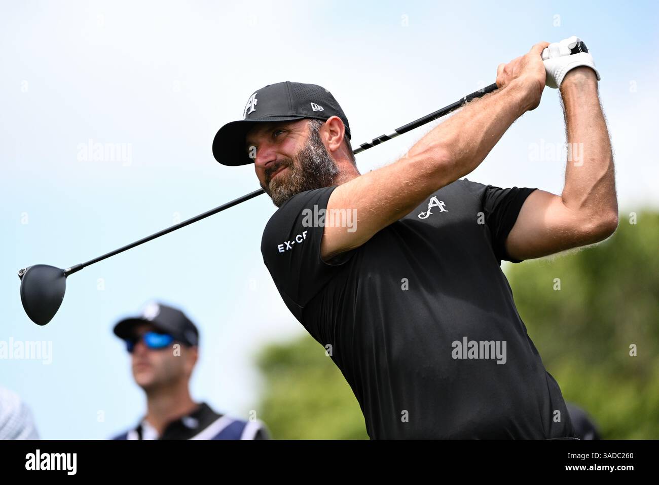 Dustin Johnson, Captain of the 4Aces GC tees off during Day 2 of the ...