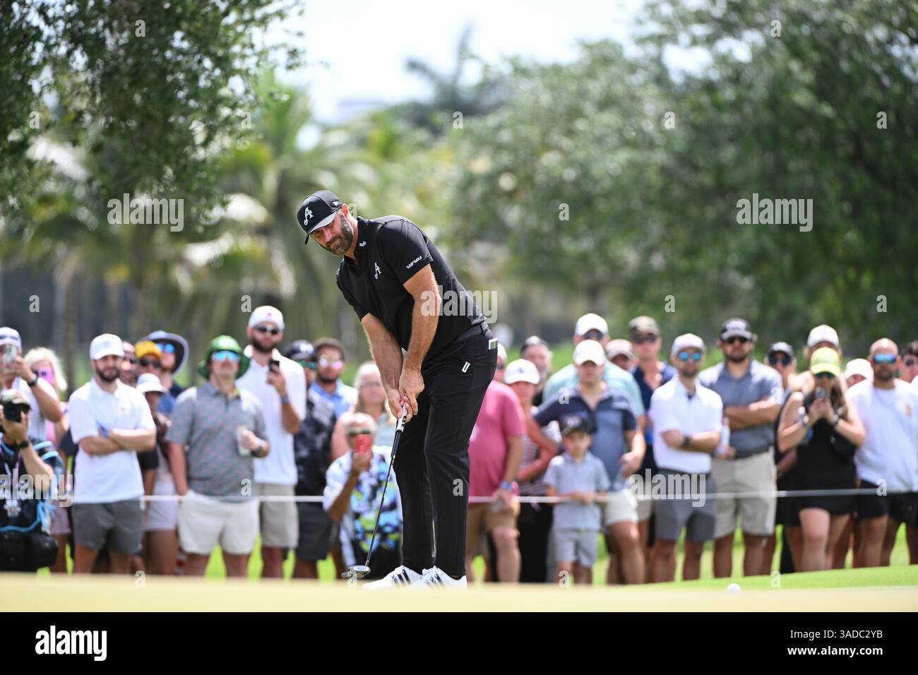 Dustin Johnson, Captain of the 4Aces GC putts during Day 2 of the 2025 ...