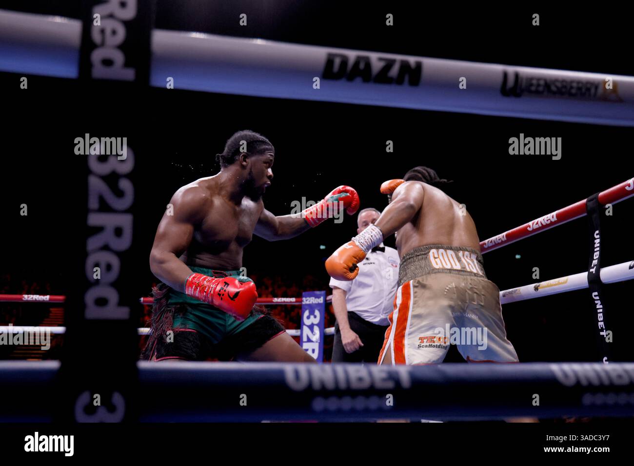 David Adeleye (left) in action against Jeamie Tshikeva for the vacant ...
