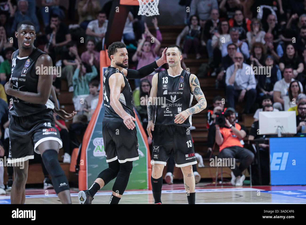 # 13 Tommaso Baldasso (Bertram Derthona Basket Tortona) and # 34 Kyle ...