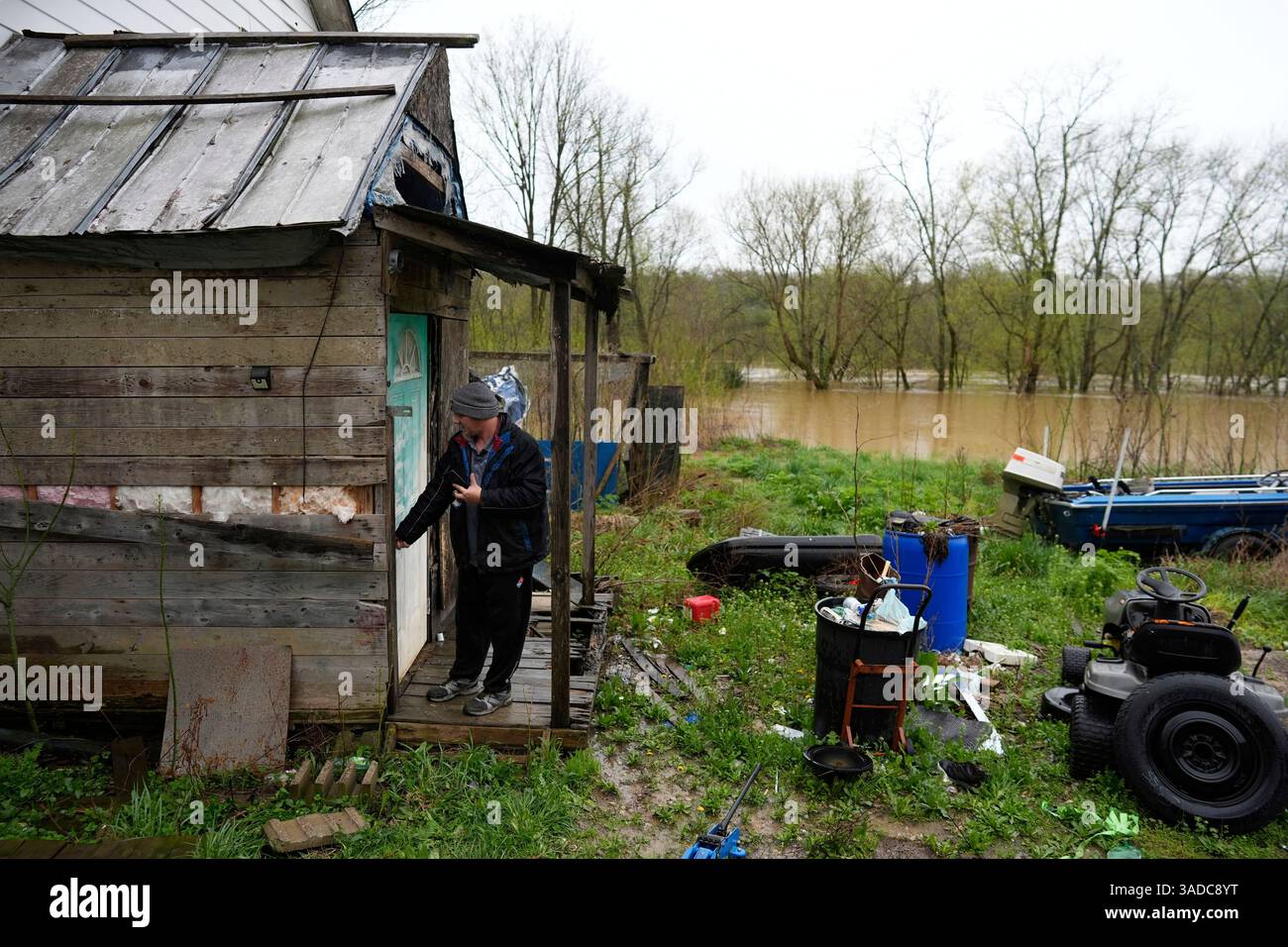 Steven Shepard locks his shed after pulling the last few items from his ...