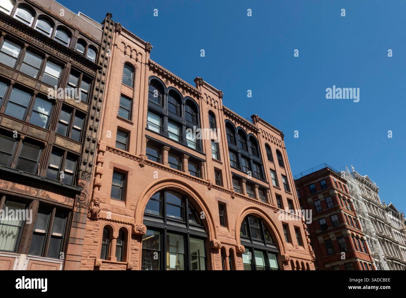 SoHo is a landmark district in lower Manhattan featuring cast-iron ...