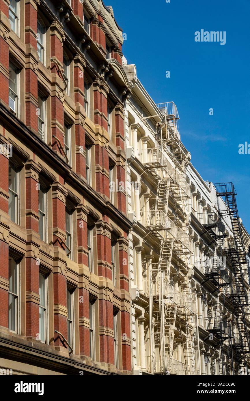SoHo is a landmark district in lower Manhattan featuring cast-iron ...