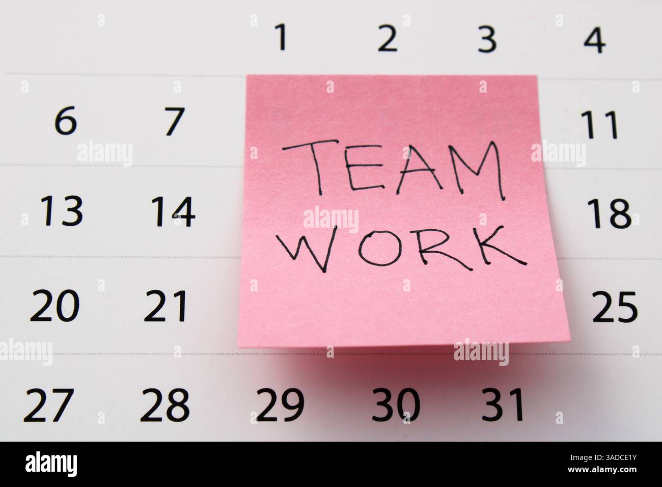 Team Work, sticky note marking day on calendar Stock Photo - Alamy