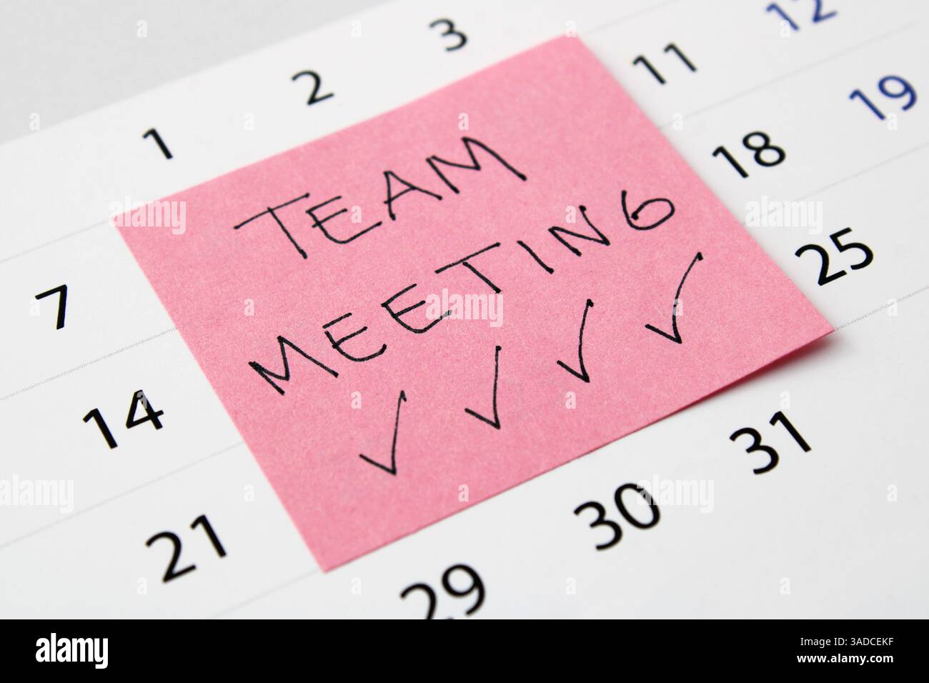 Team meeting, sticky note on calendar Stock Photo - Alamy