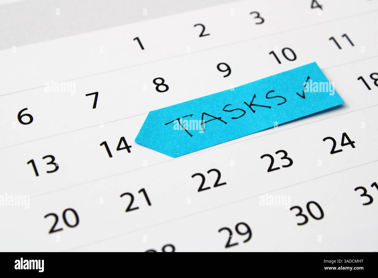 Sticky note with tasks checkmark Stock Photo - Alamy