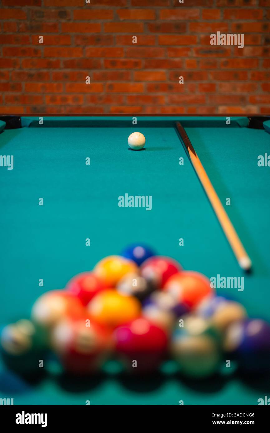 Billiard balls on a green billard table Stock Photo - Alamy