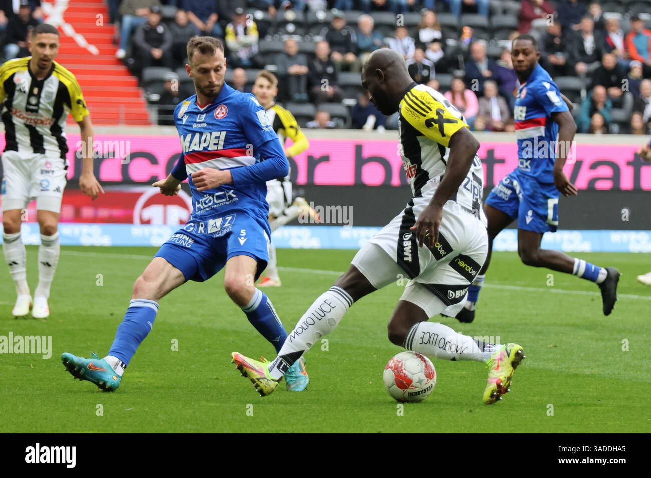 LINZ, AUSTRIA - APRIL 5: Petar Filipovic of GAK and Samuel Adeniran of ...