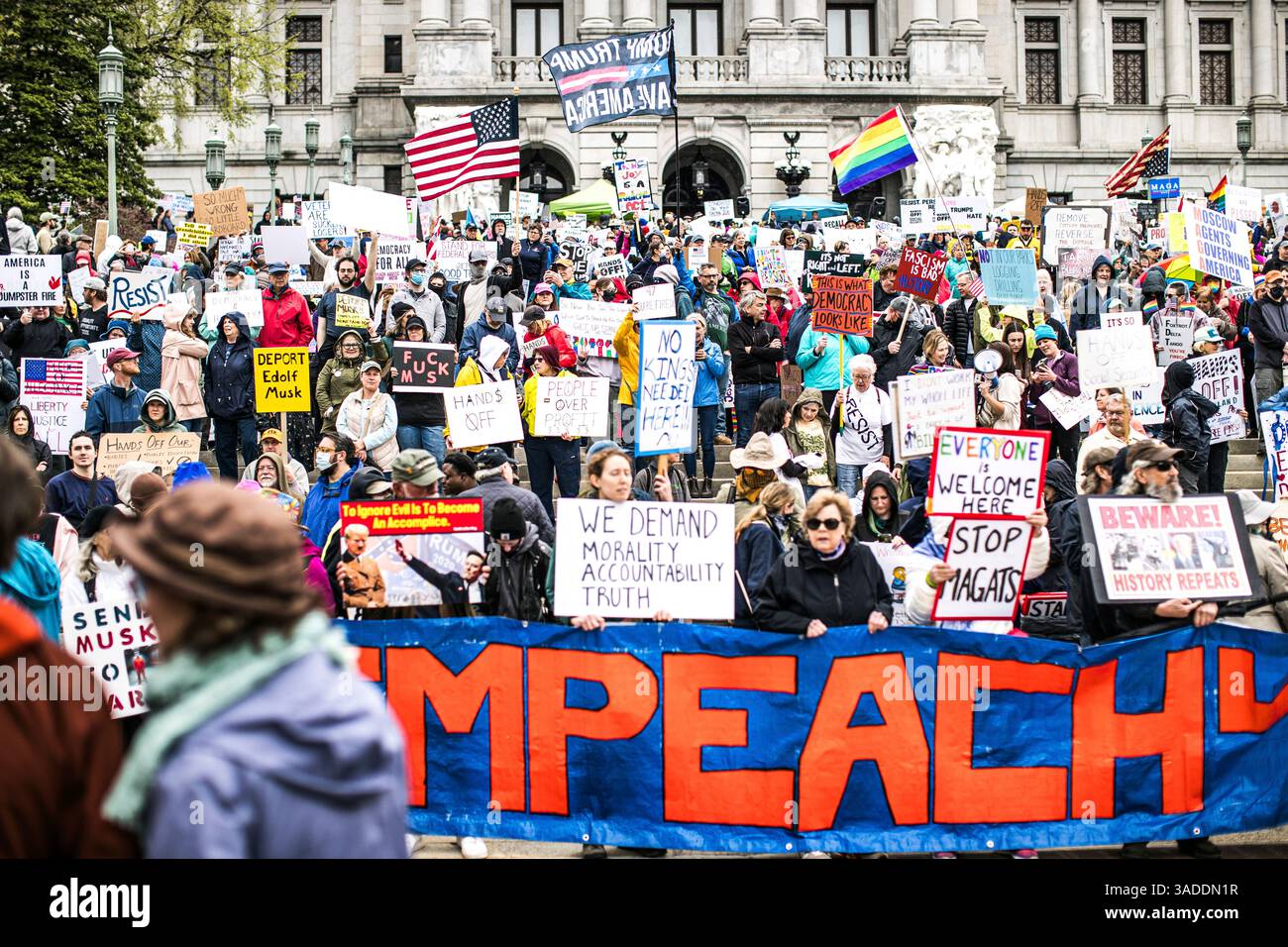 Demonstrators hold a rally at the Pennsylvania state capitol in ...