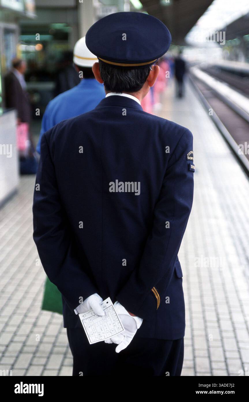 Nov 01, 2000; Tokyo, Japan; A Japanese rail guard awaits a Japanese ...