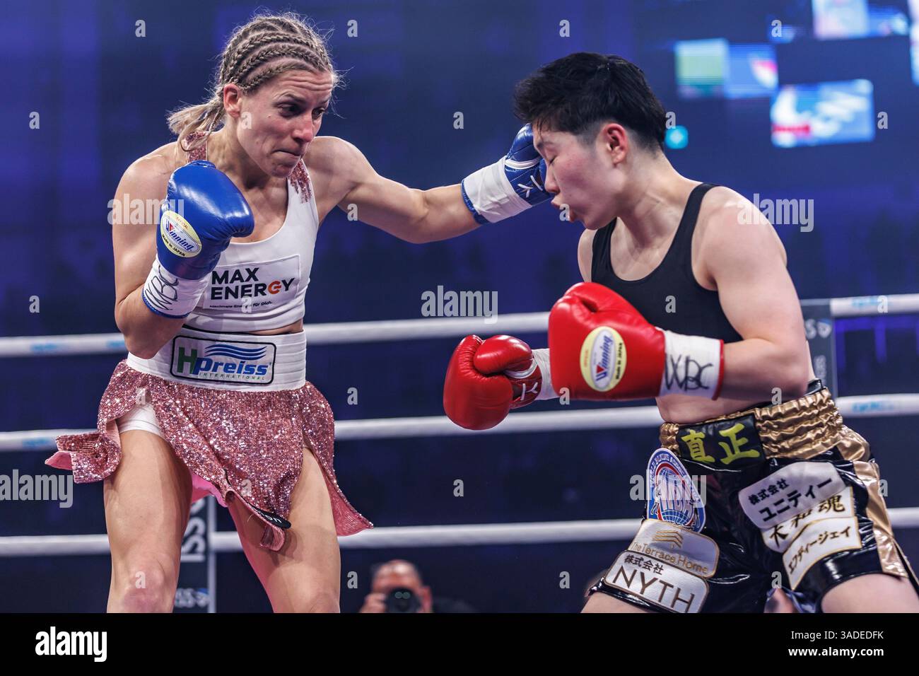Germany's Tina Rupprecht, left, and Japan's Sumire Yamanaka battle during a WBC, WBA, WBO, IBF ...