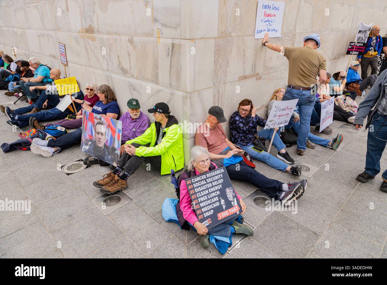 April 5, 2025, Washington, District Of Columbia, USA: Demonstrators sit ...