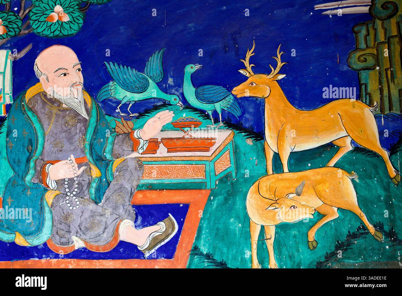 Mural showing a sage in harmony with deer and birds, symbolising the ...