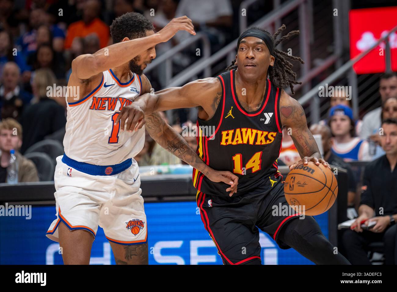 Atlanta Hawks guard Terance Mann (14) dribbles the ball against New ...