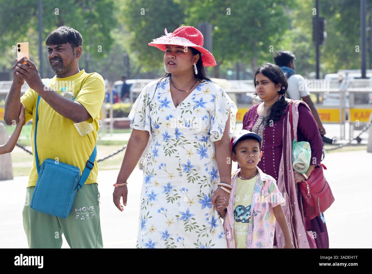 NEW DELHI, INDIA - APRIL 5: Visitors out on a hot afternoon at Kartavya Path, on April 5 2025 in ...