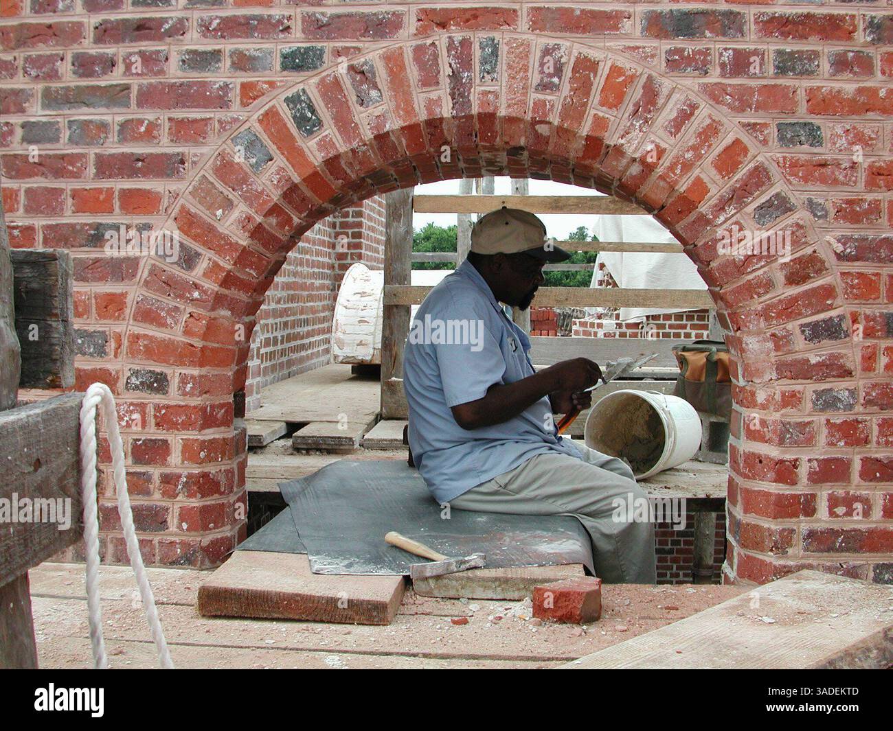 Mason Joe Slaughter of Lynchburg, Va., assembles a window arch. The ...
