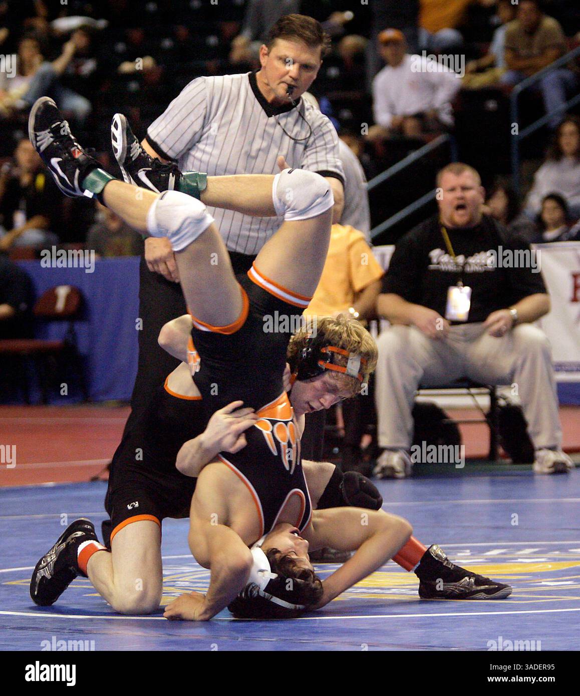 Henry A. Barrios / The Californian.Selma High's Nick Pena flips on his head to try and escape ...