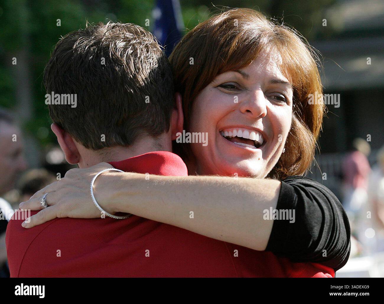 John Harte / The Californian..Stockdale High health teacher Sloan Holmes embraces her son ...