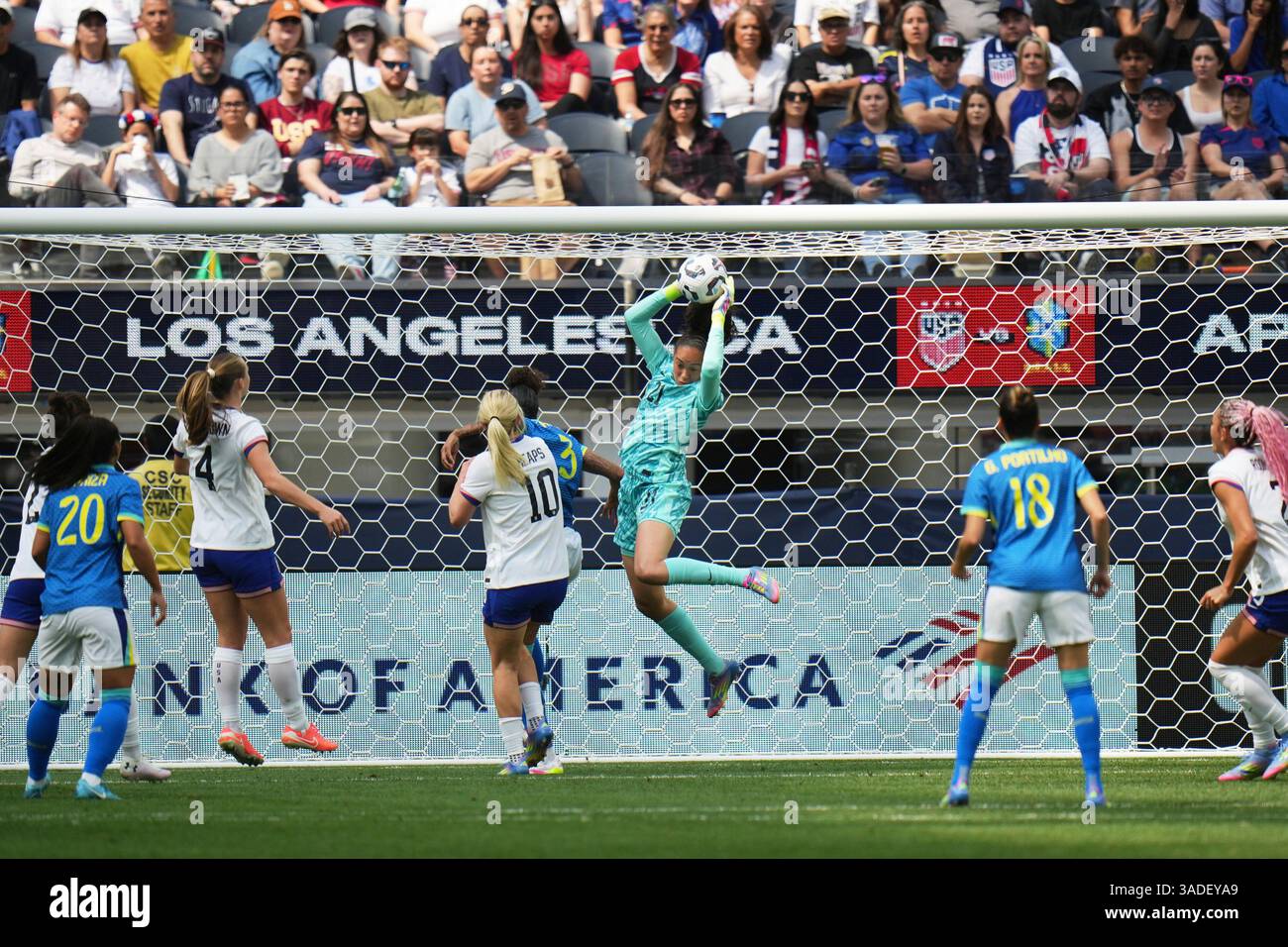 United States goalkeeper Phallon Tullis-Joyce (21) makes a save against ...