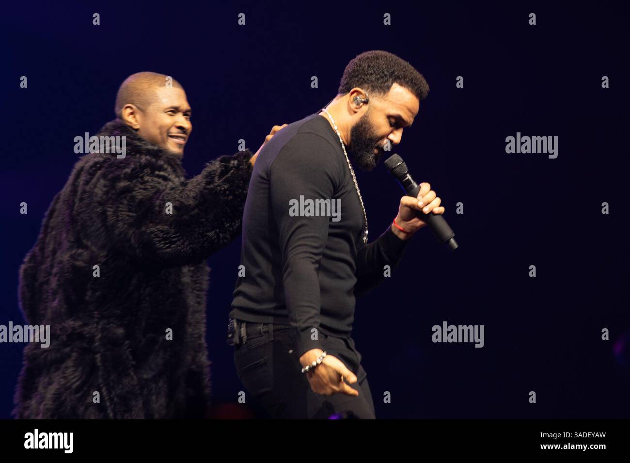 London, England. 5th April 2025. Usher brings on stage another R&B ...