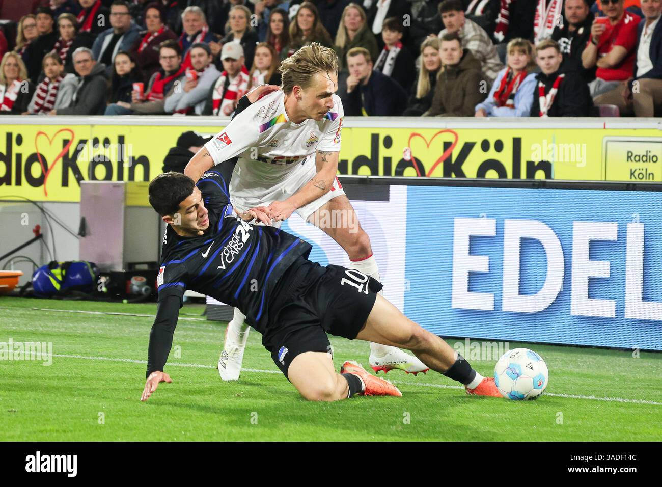 Koeln, Deutschland. 05th Apr, 2025. Mathias Olesen (Koeln #47) im Zweikampf mitIbrahim Maza ...