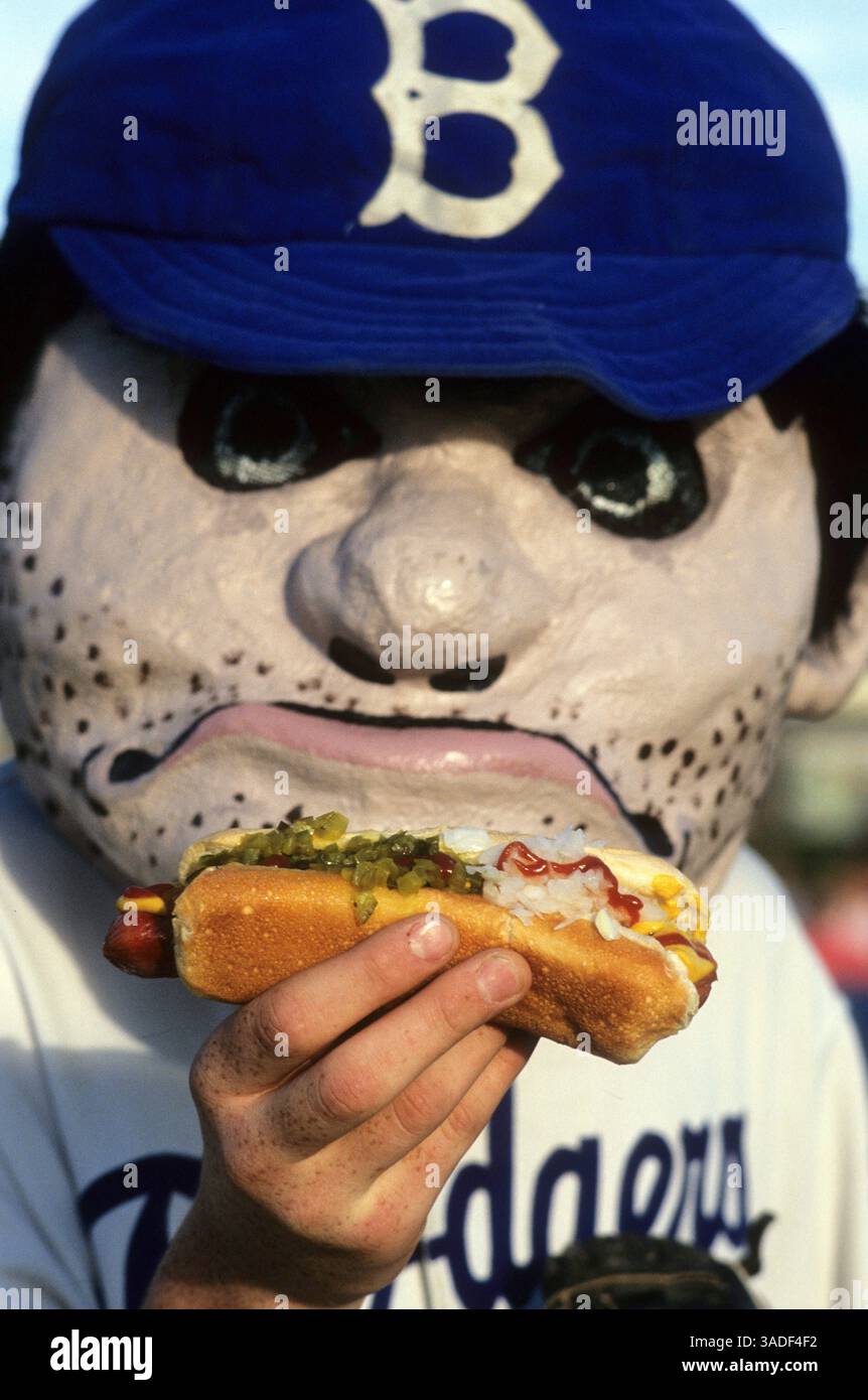 Bakersfield Dodgers mascot Rodger Dodger shows off a hot dog at one of ...