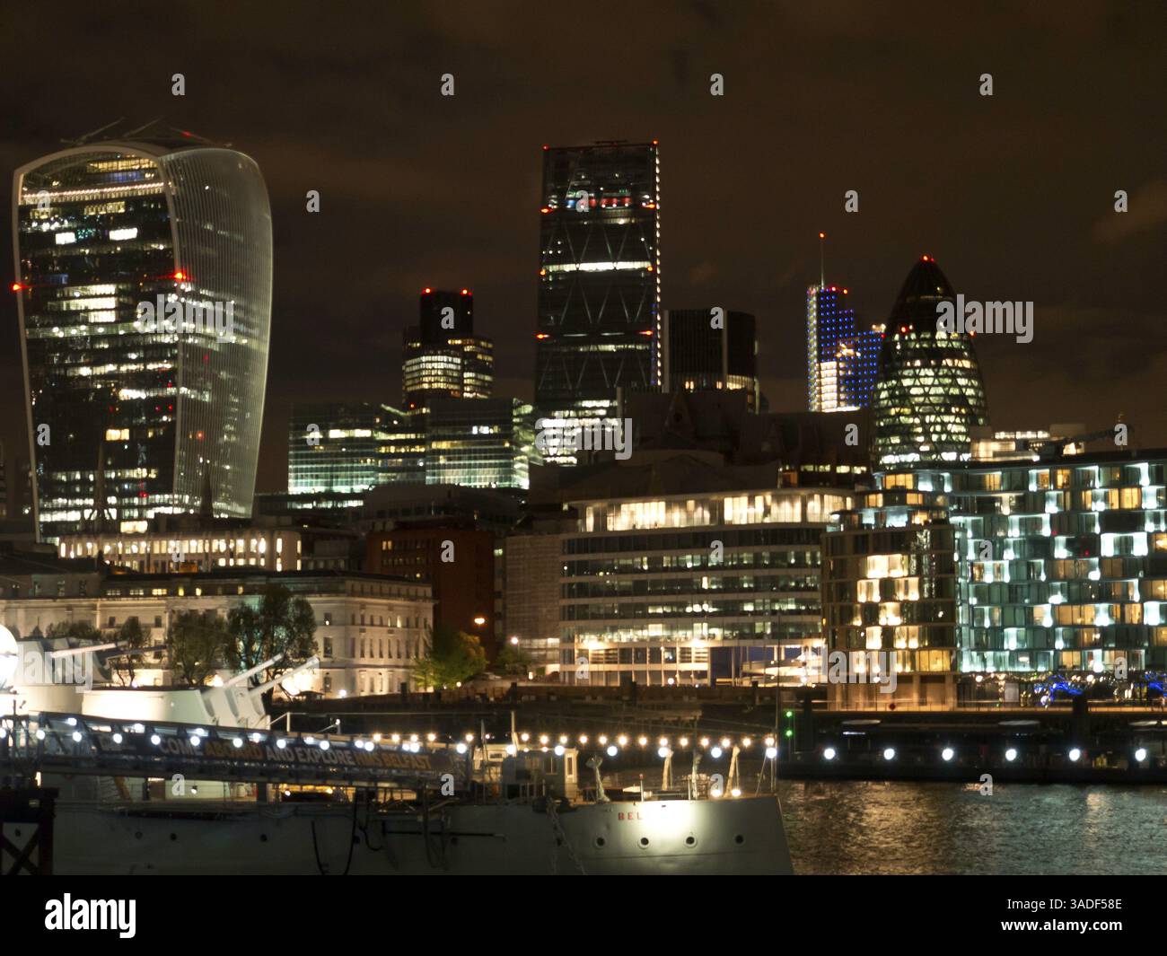 Illuminated skyscrapers and modern architecture dominate the night ...