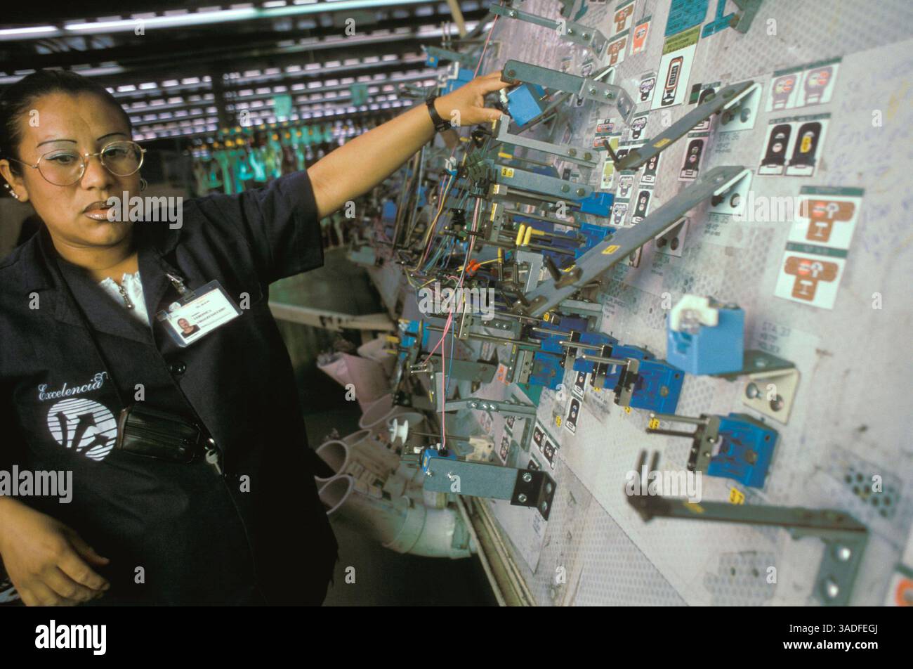 May 02, 2003; Ciudad Juarez, Mexico; A worker at the Delphi Automotive ...