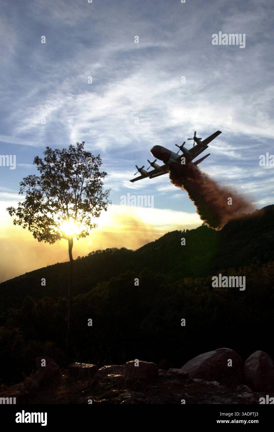 Oct 27, 2003; San Bernardino, CA, USA; A tanker drop spreads fire ...