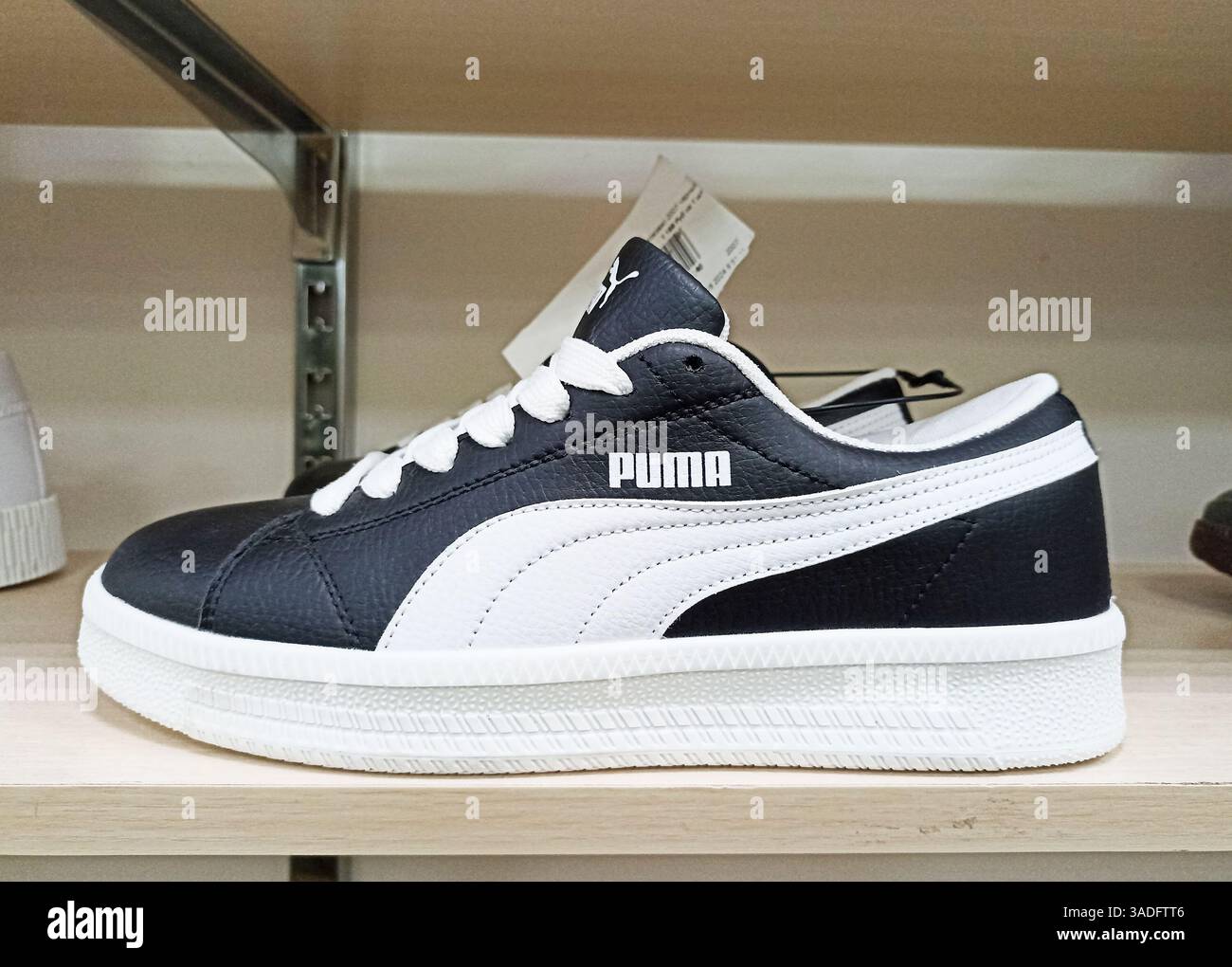 Aktau, Kazakhstan - March 22, 2025: Black and white puma sneaker on ...