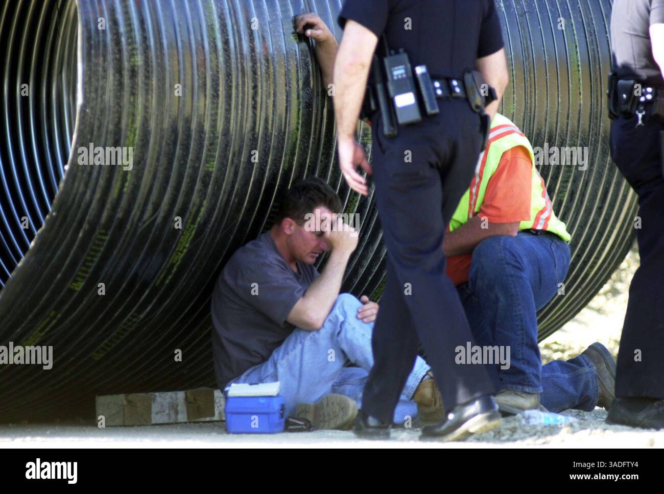 Mar 17, 2004; RIALTO, CA, USA; Excavator operator Kevin Montgomery is ...