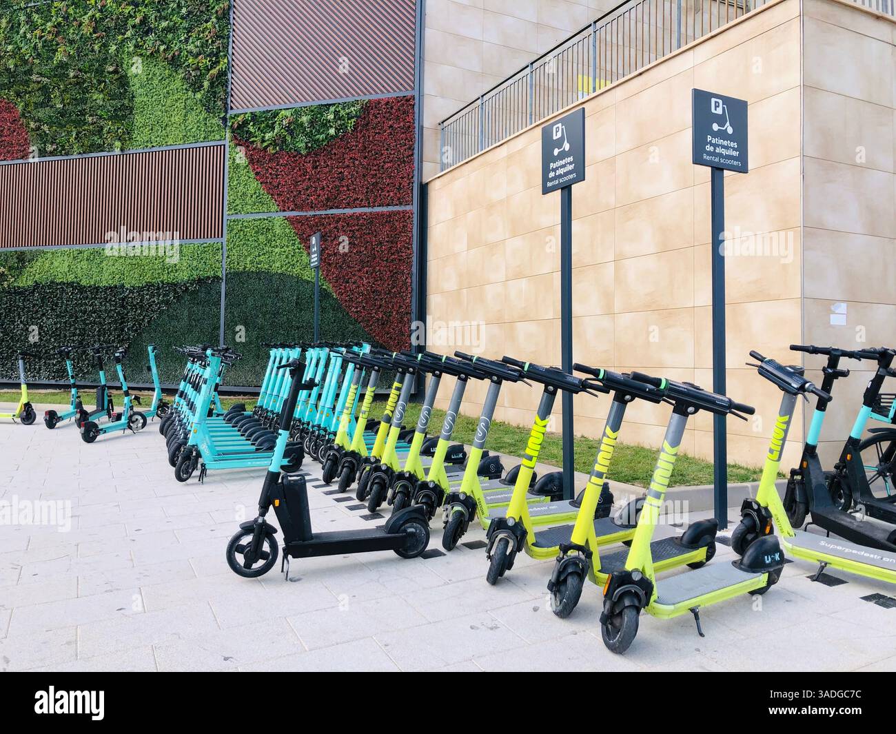 Alicante, Spain - April, 2025: Electric scooter parking at Zenia ...