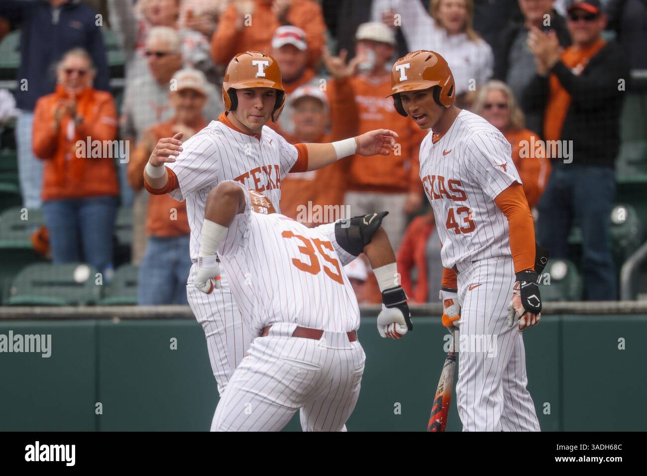 AUSTIN, TX - APRIL 05: Texas outfielder Tommy Farmer IV (43) and Texas ...